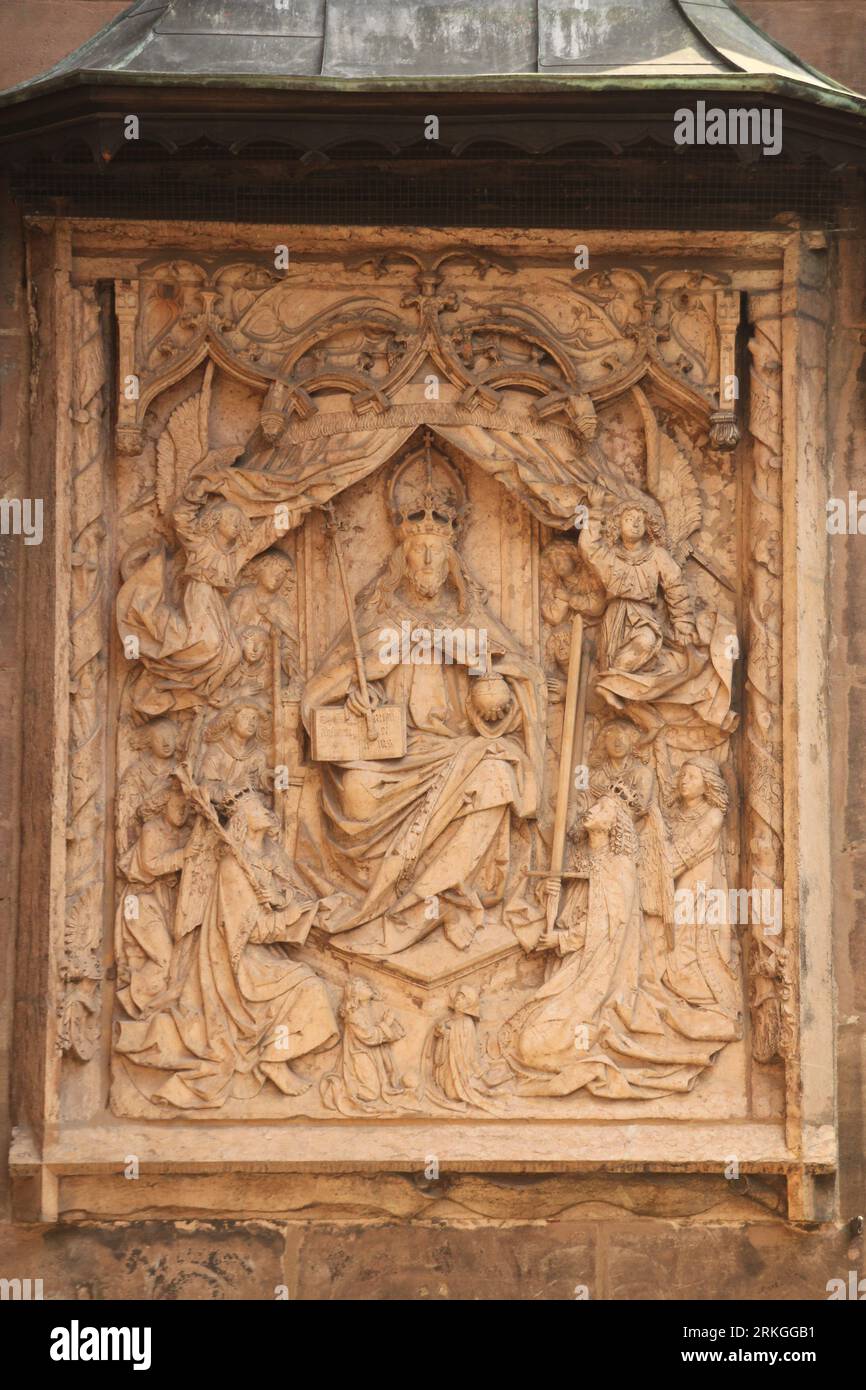 A detailed relief sculpture adorning the entryway of an iconic ...