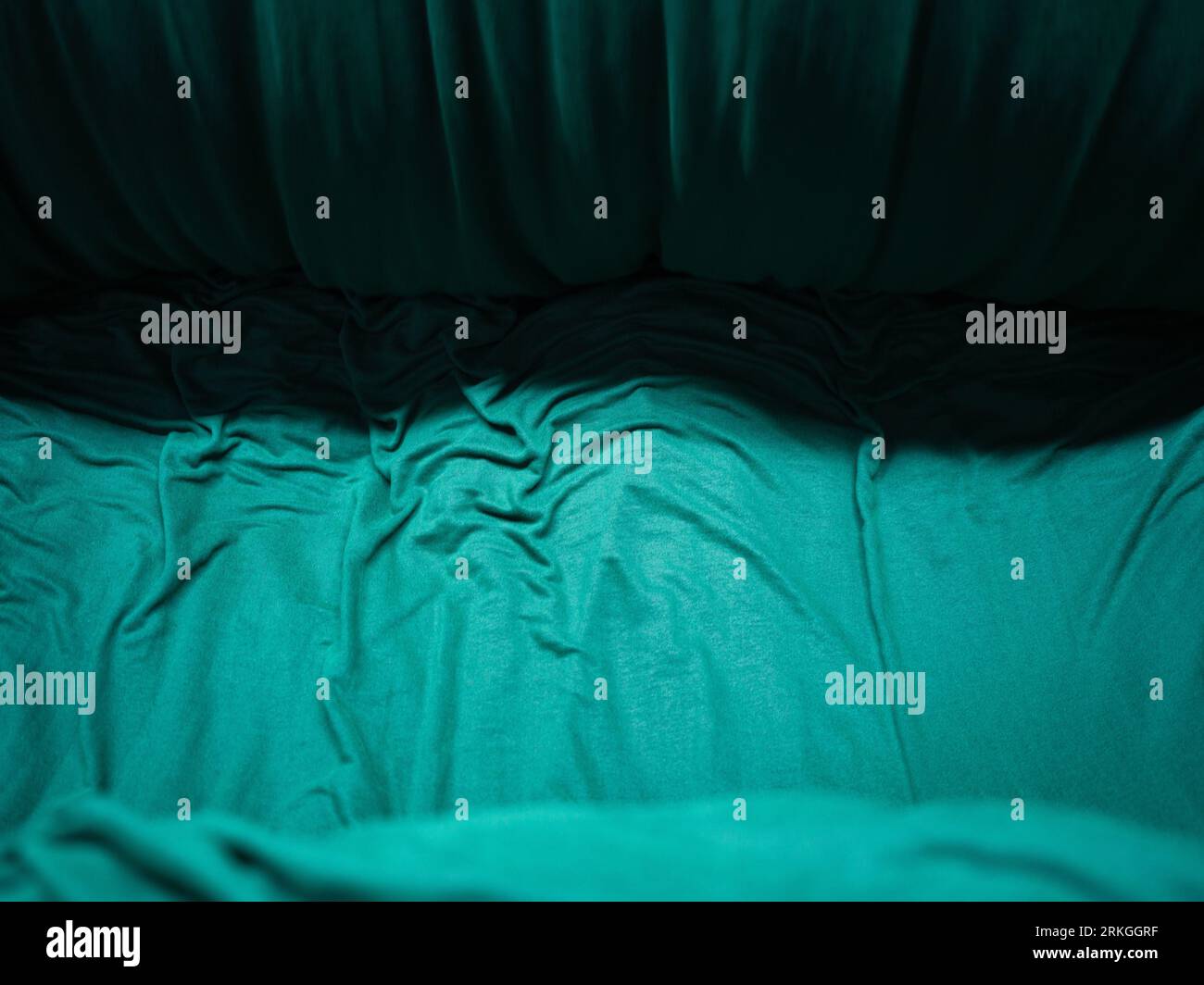 A green cloth draped over the floor Stock Photo - Alamy