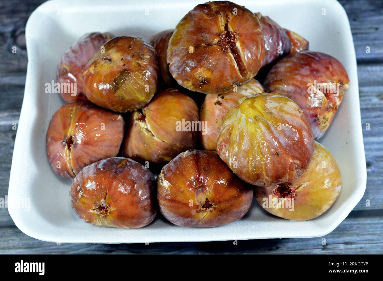 plate of fresh figs fruit, The fig is the edible fruit of Ficus carica ...