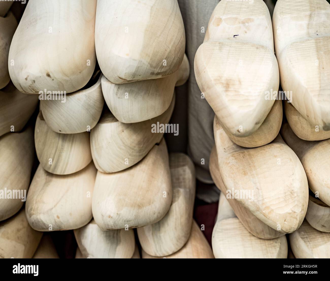 A closeup of a stack of traditional Dutch wooden clogs Stock Photo - Alamy