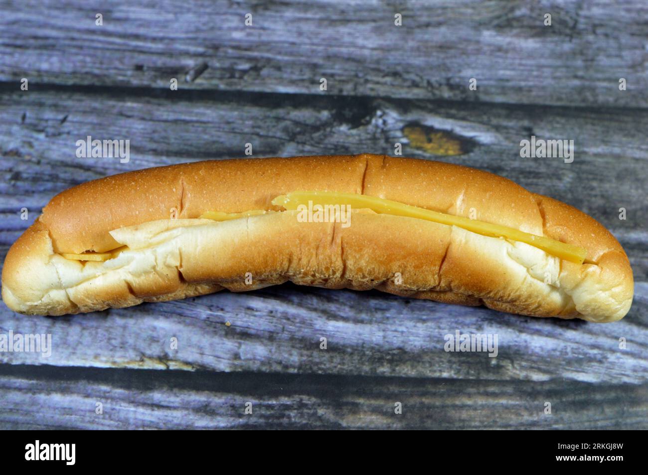 Rumi Cheese sandwich in a long bun, Slices of Egyptian Rumi cheese ...