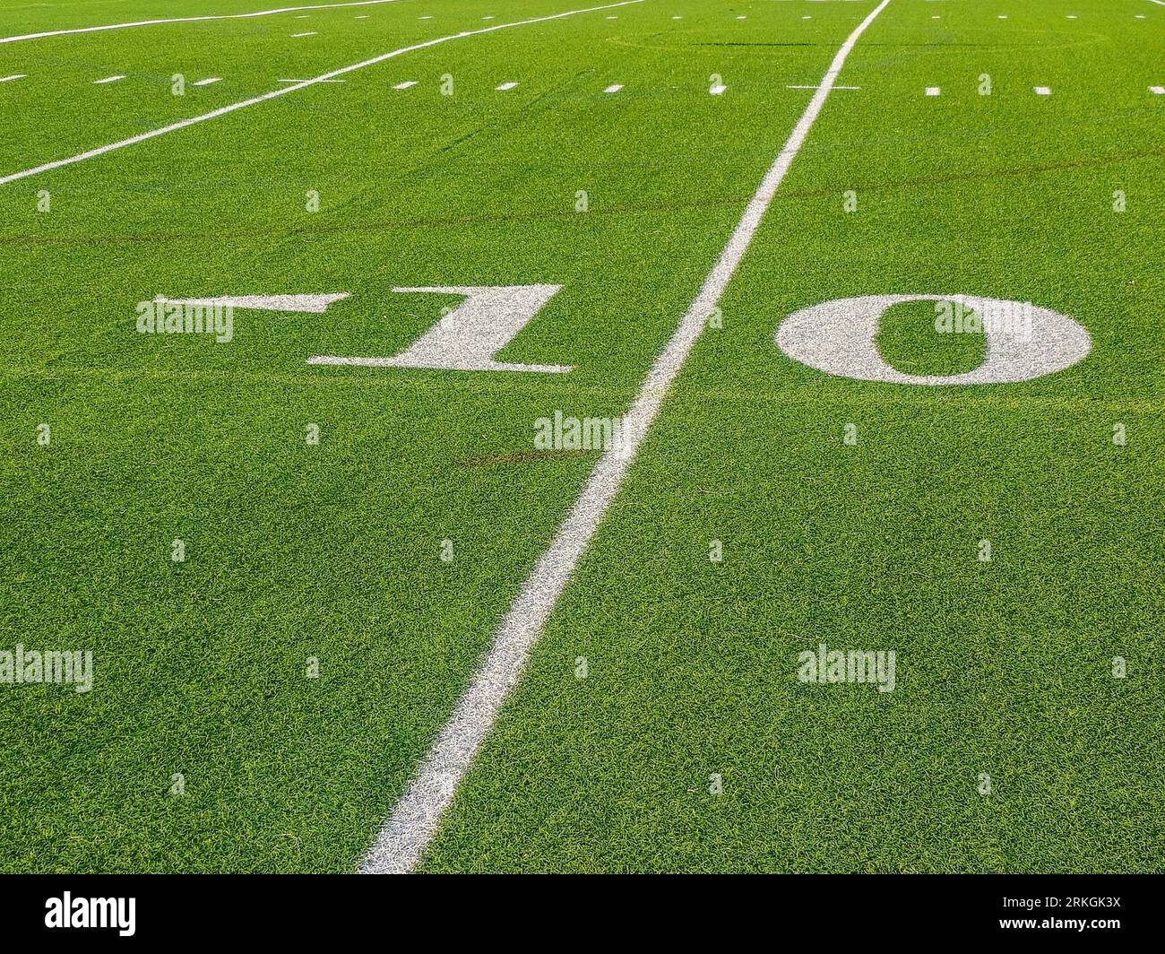 A yards sign of an American football field Stock Photo - Alamy