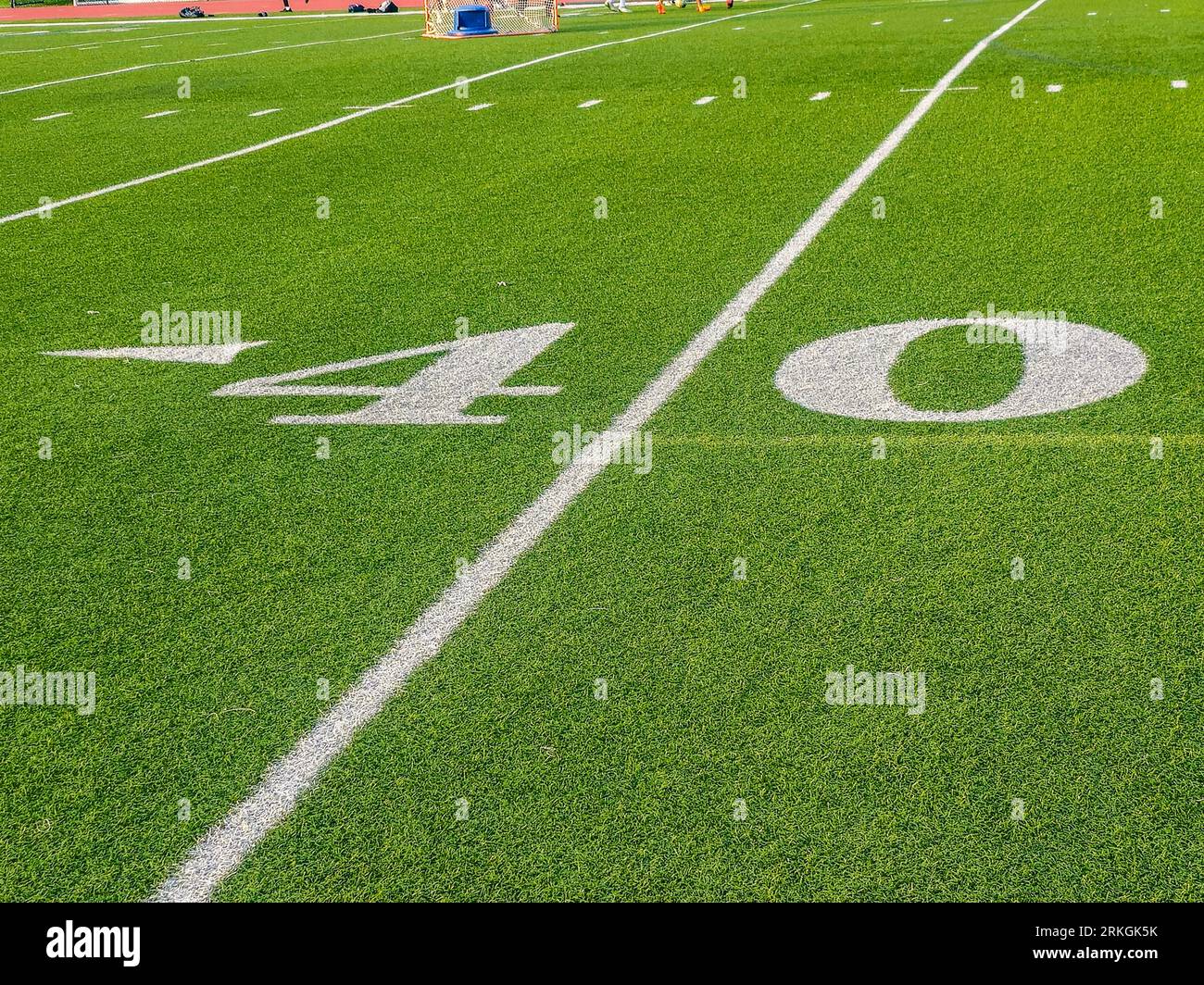 A yards sign of an American football field Stock Photo - Alamy