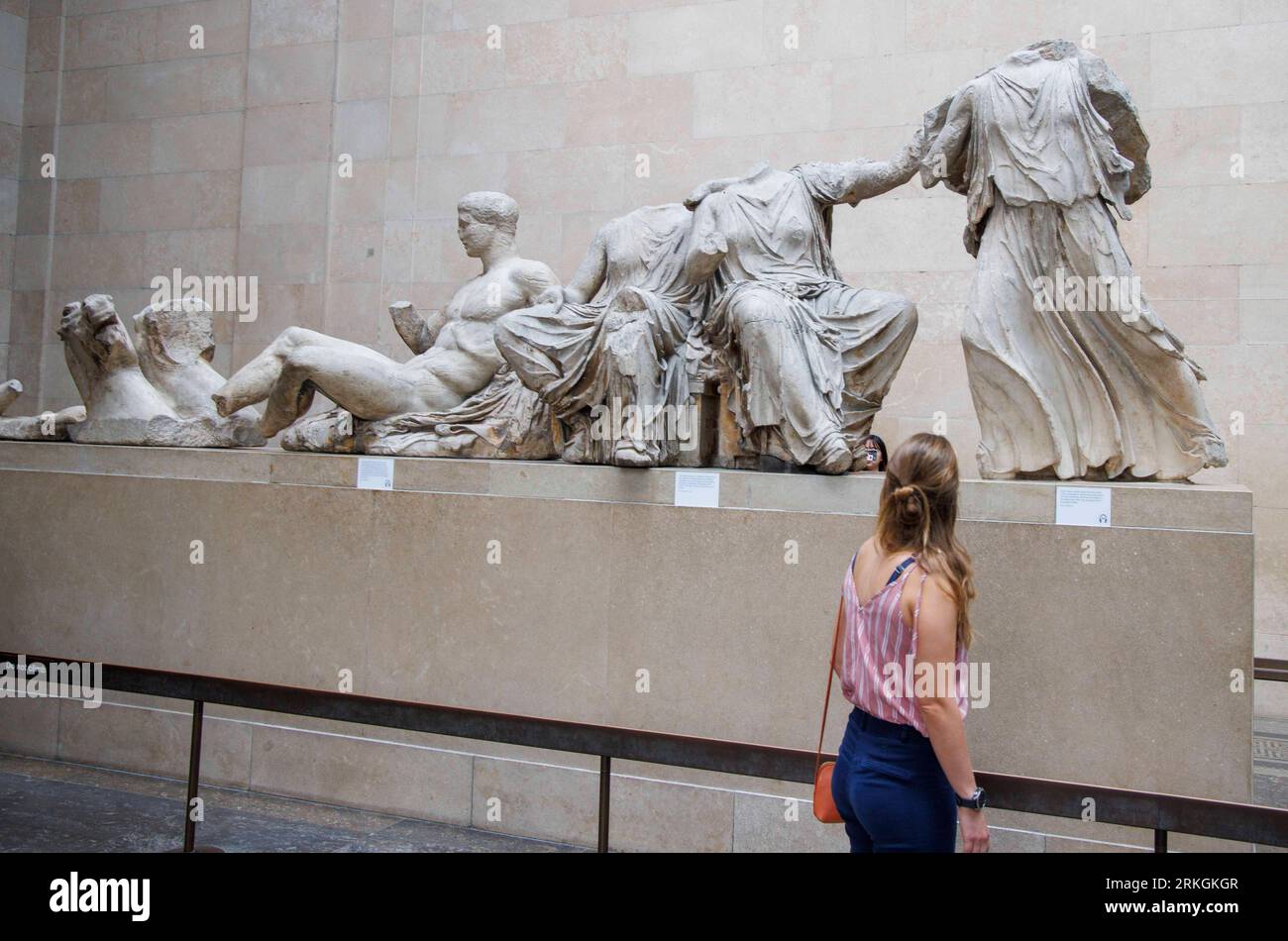 London, UK. 25th Aug, 2023. Visitors at the British Museum looking at the Elgin Marbles in the ...