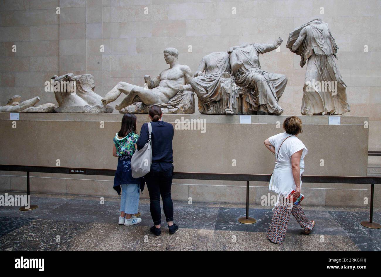 London, UK. 25th Aug, 2023. Visitors at the British Museum looking at the Elgin Marbles in the ...