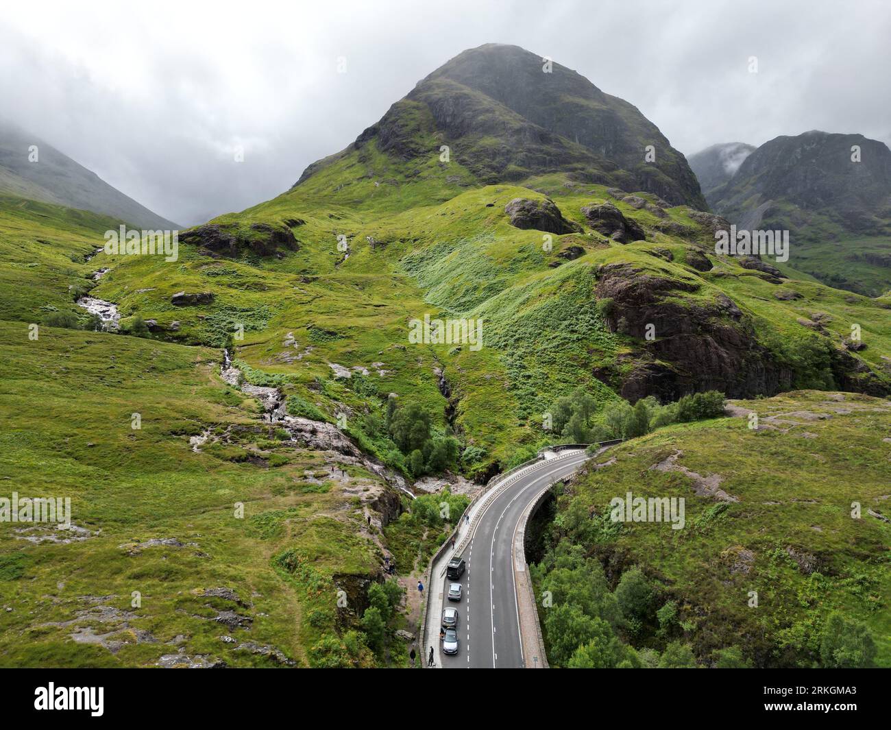 An aerial view of cars driving through the Meeting of Three Waters in ...
