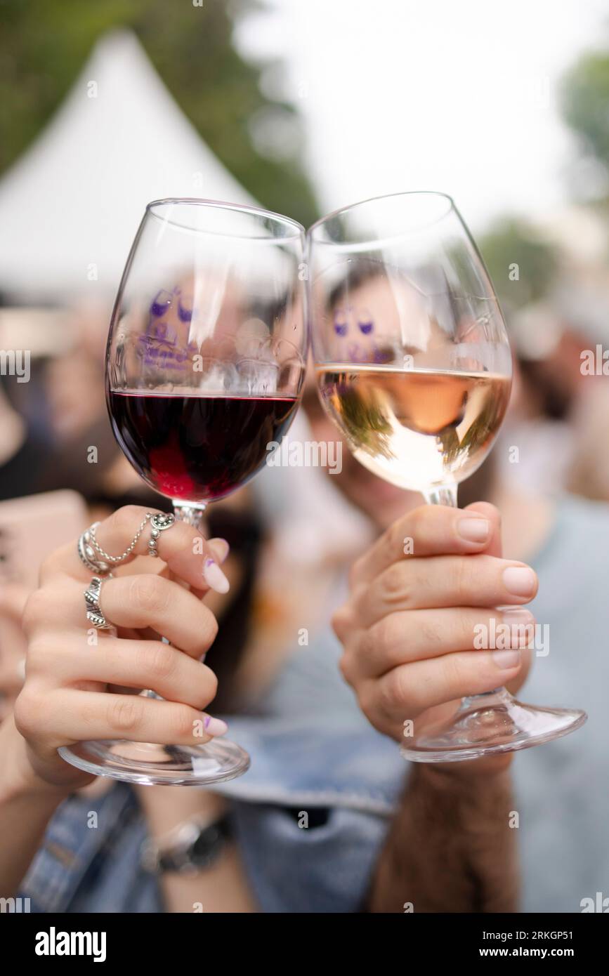 A vertical shot of a group of people enjoying a social gathering in a ...