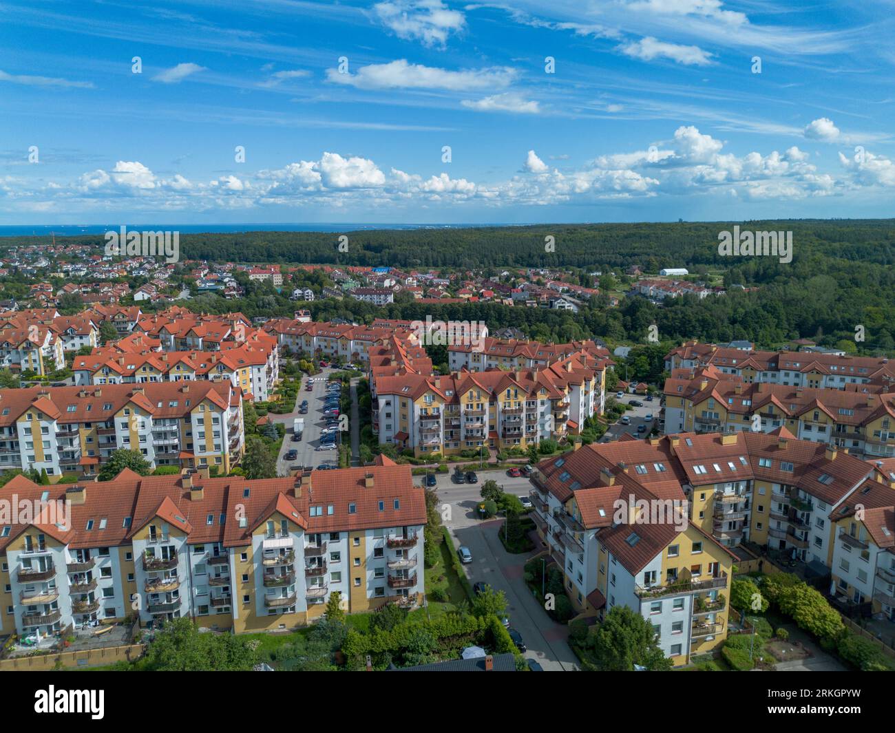 An Aerial view of a modern cityscape featuring a network of roads ...