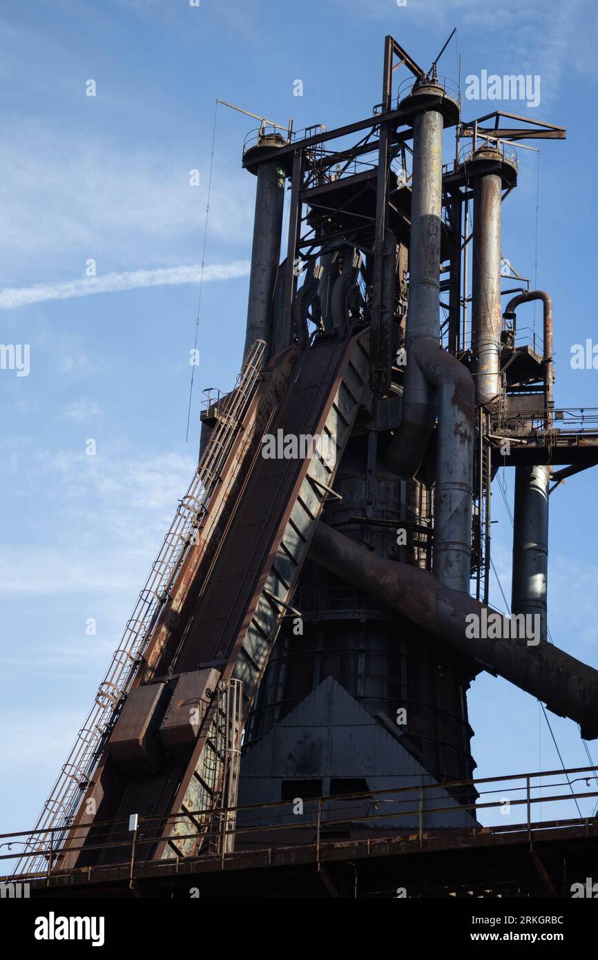 An old industrial steel mill located with a large structure with a ...