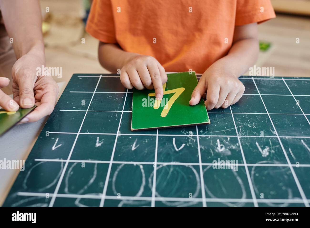 smart girl counting near teacher, chalkboard, learning how to count in ...