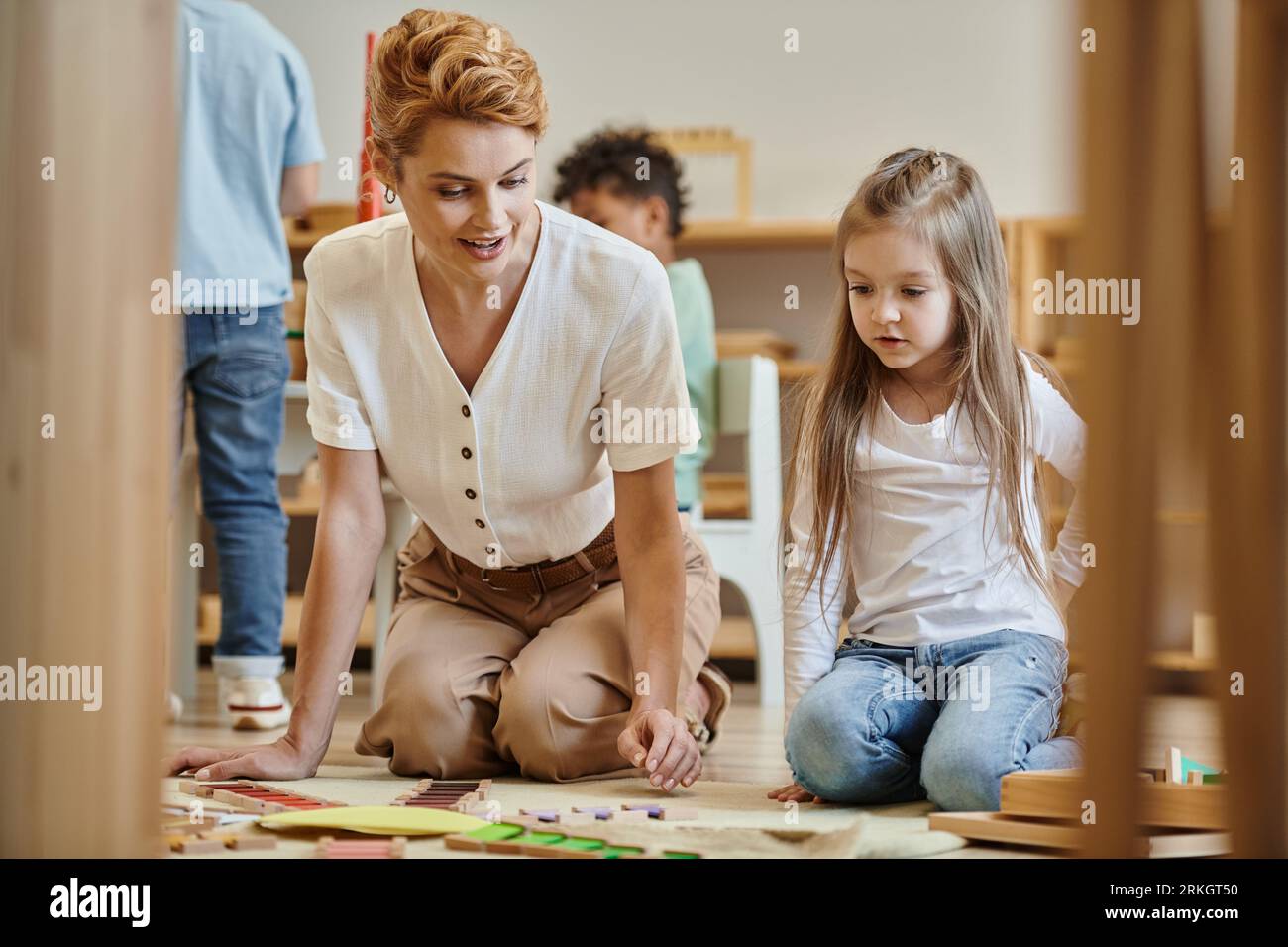 Blonde teacher hi-res stock photography and images - Alamy
