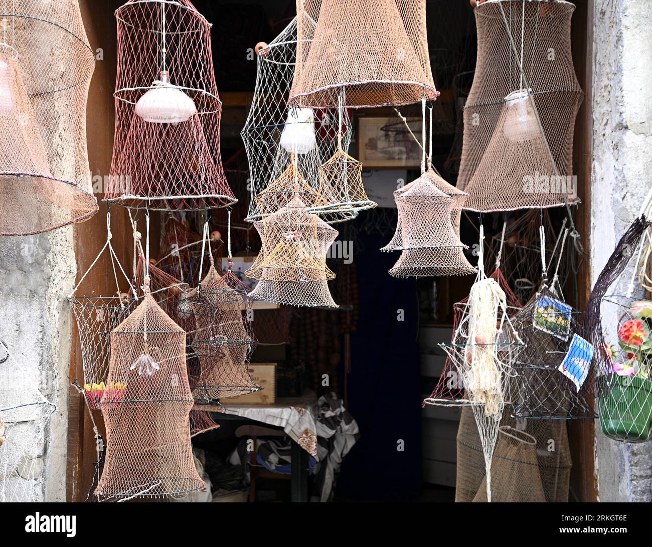 Traditional fishing cast nets with lamps and fishing baskets on a local ...