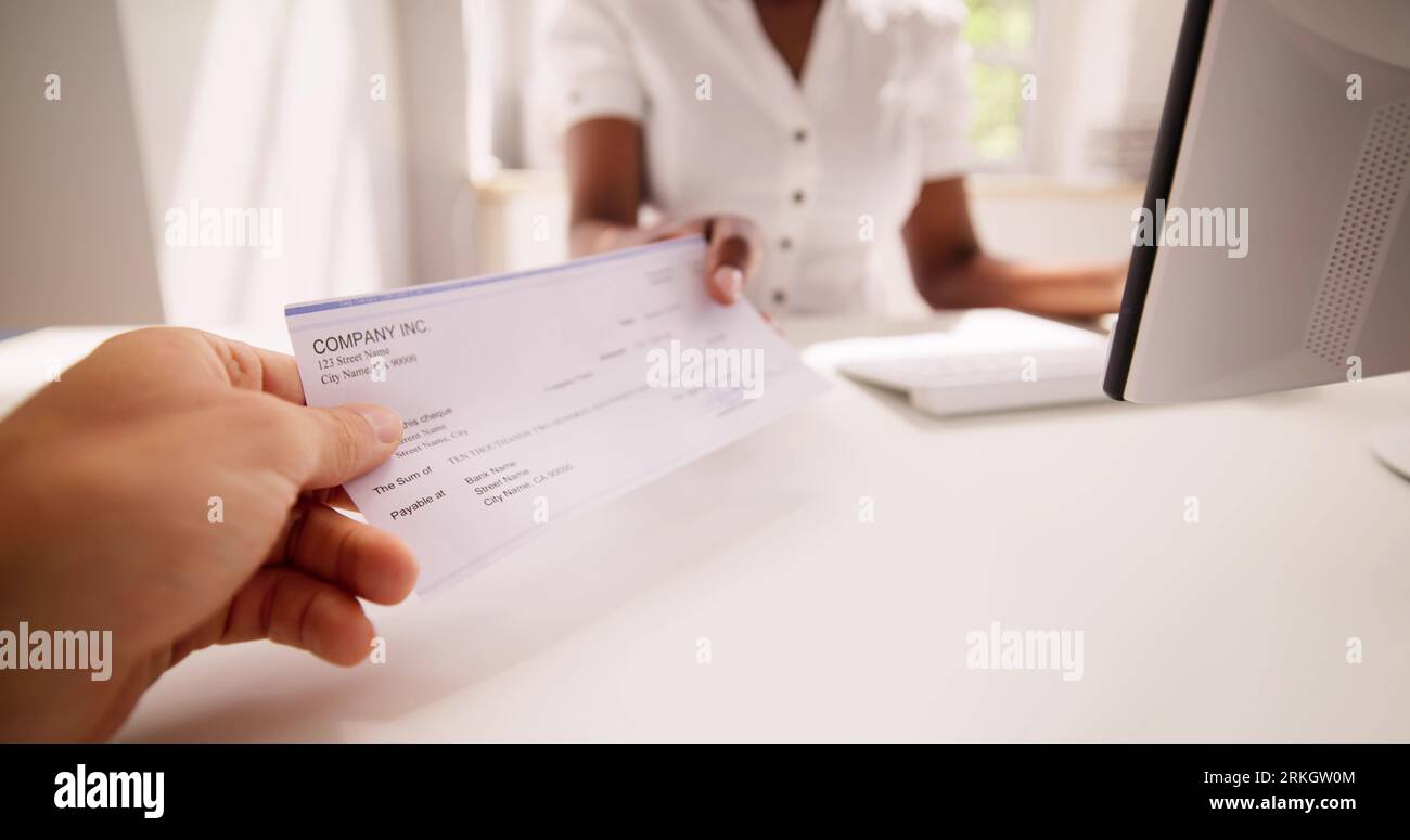 African american women writing check hi-res stock photography and ...