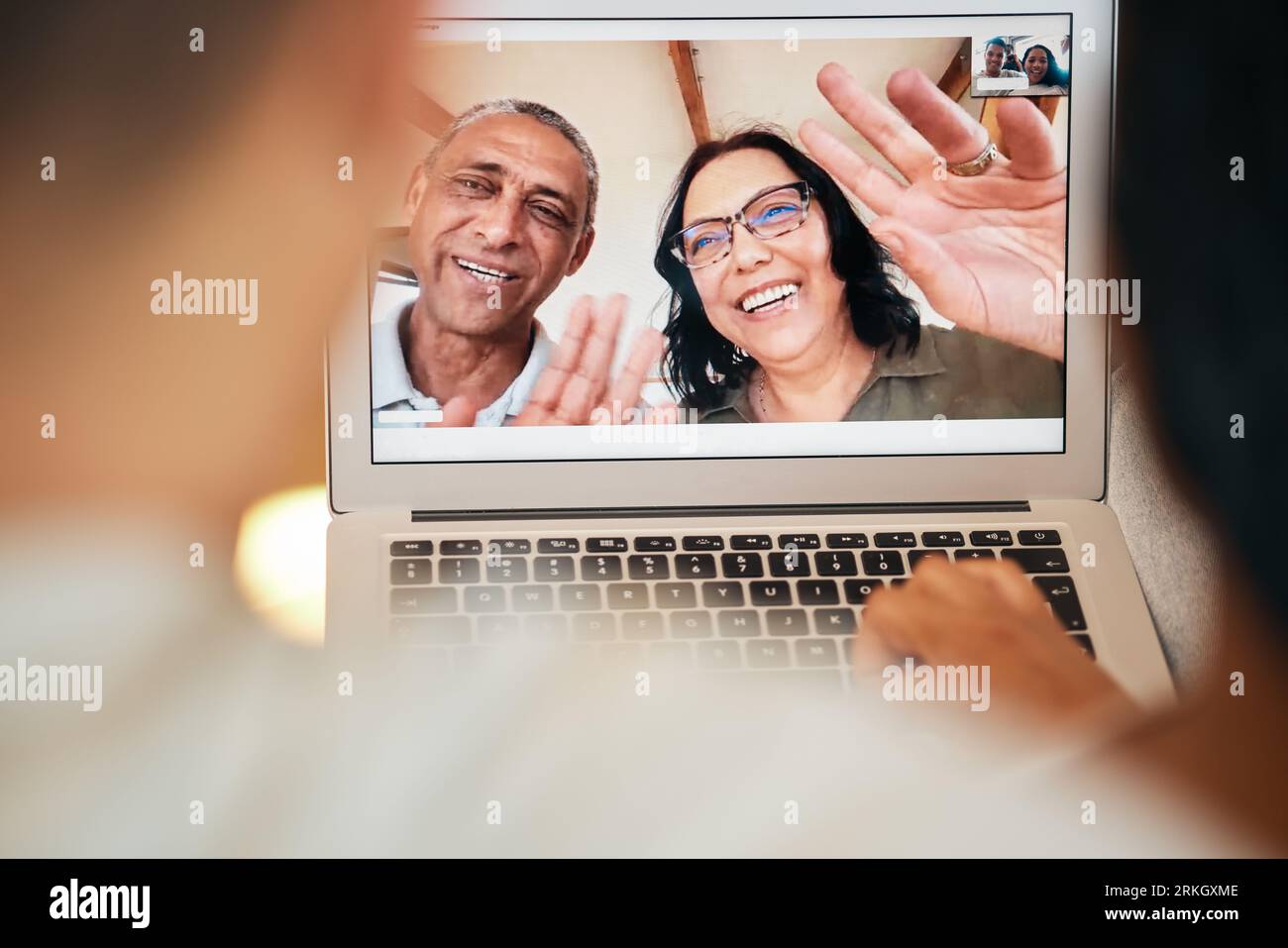 Video call, laptop screen and wave with face of family for ...