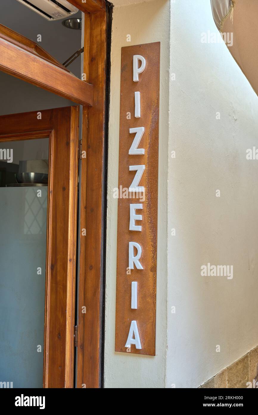 The majestic entrance of a classic late 1800s building is visible ...