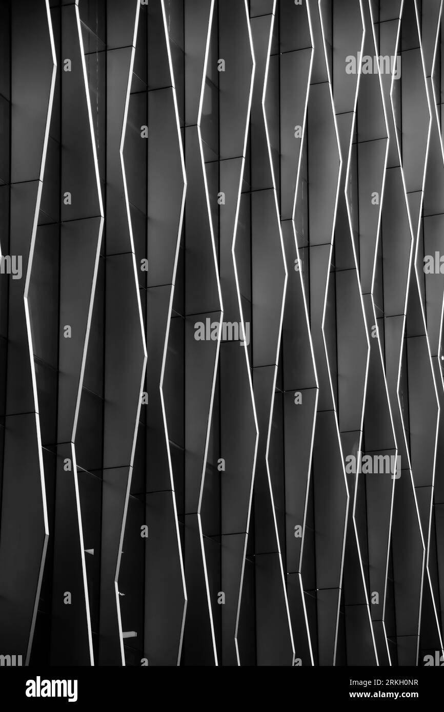 A vibrant art deco-style structure stands tall with a side view Stock ...