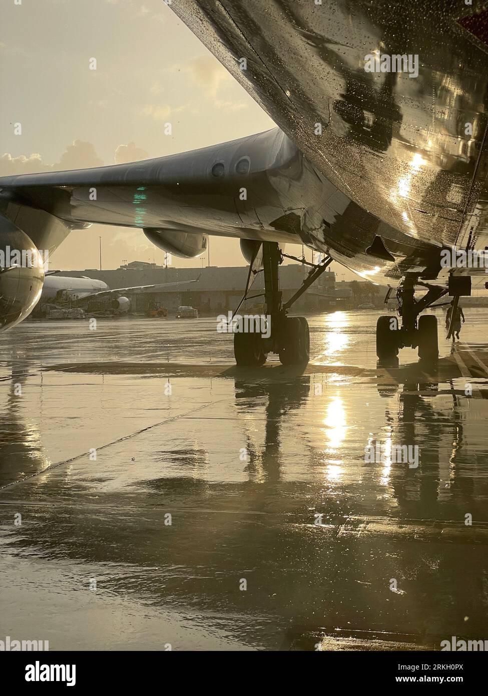 Illuminated runway in rainy hi-res stock photography and images - Alamy
