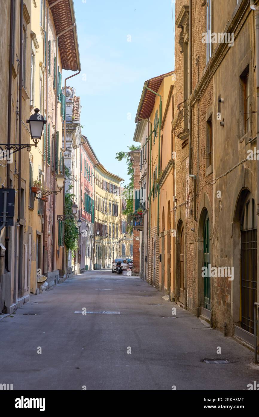 An empty street and old buildings in Pisa, Tuscany, Italy Stock Photo ...