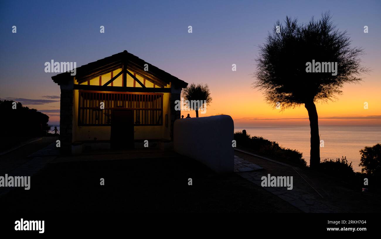 idyllic sunset on the French coast, magenta, orange and blue colors in ...