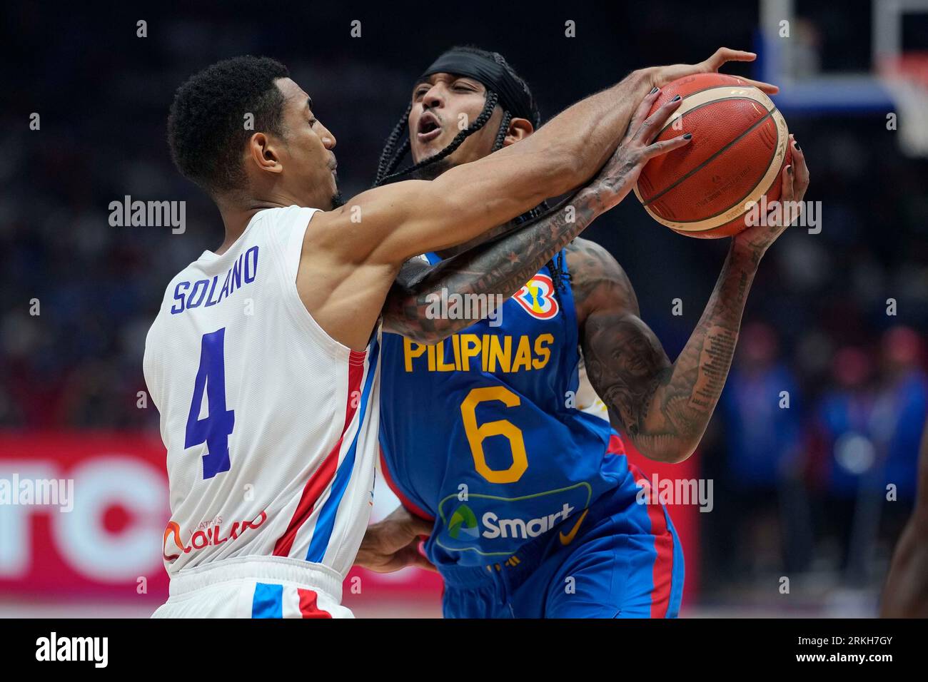 Philippines guard Jordan Clarkson (6) is blocked by Dominican Republic ...