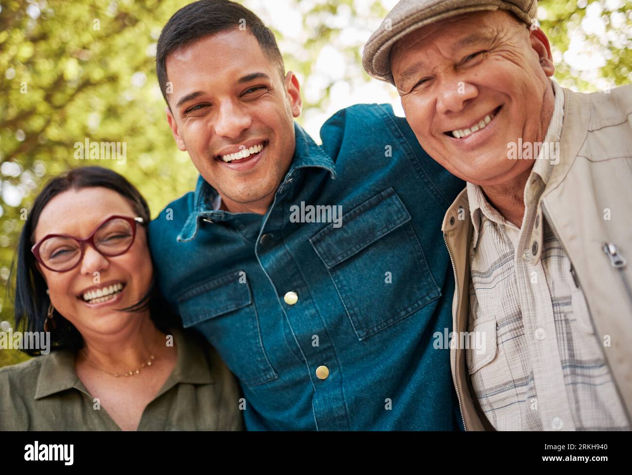 Nature portrait, mature parents and son smile for outdoor wellness ...