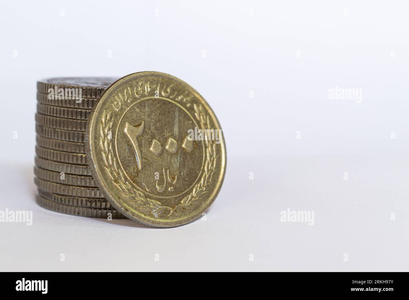 The Islamic republic of Iran 2000 rials coin on a white background ...