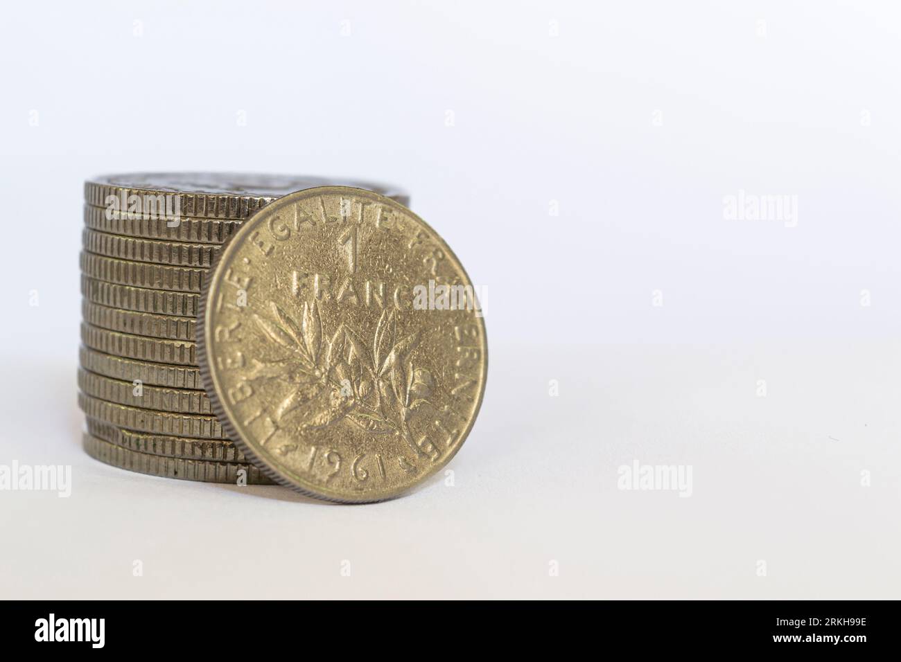 A small French franc coin isolated on a white background Stock Photo ...