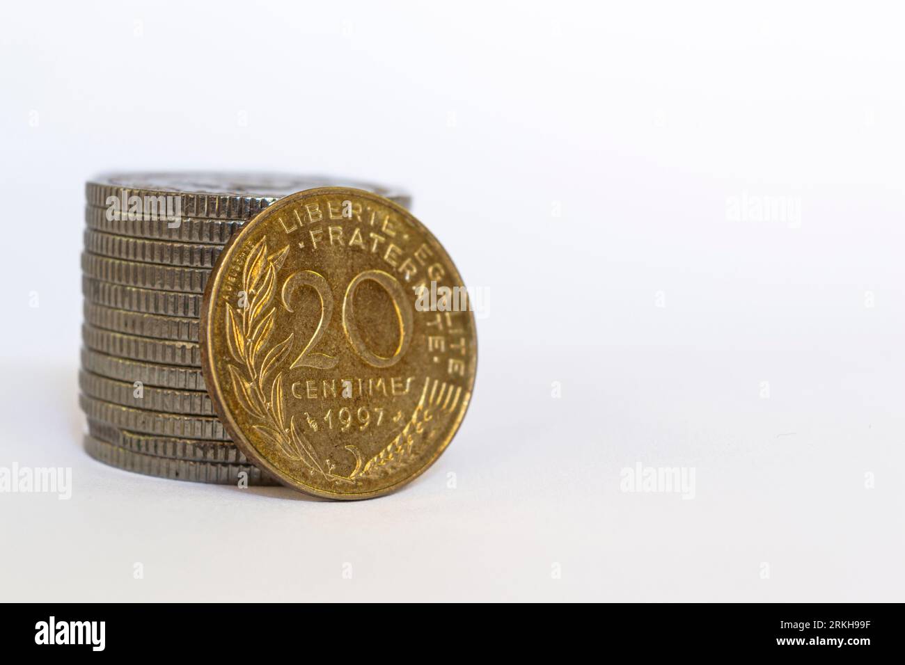 A small French franc coin isolated on a white background Stock Photo ...