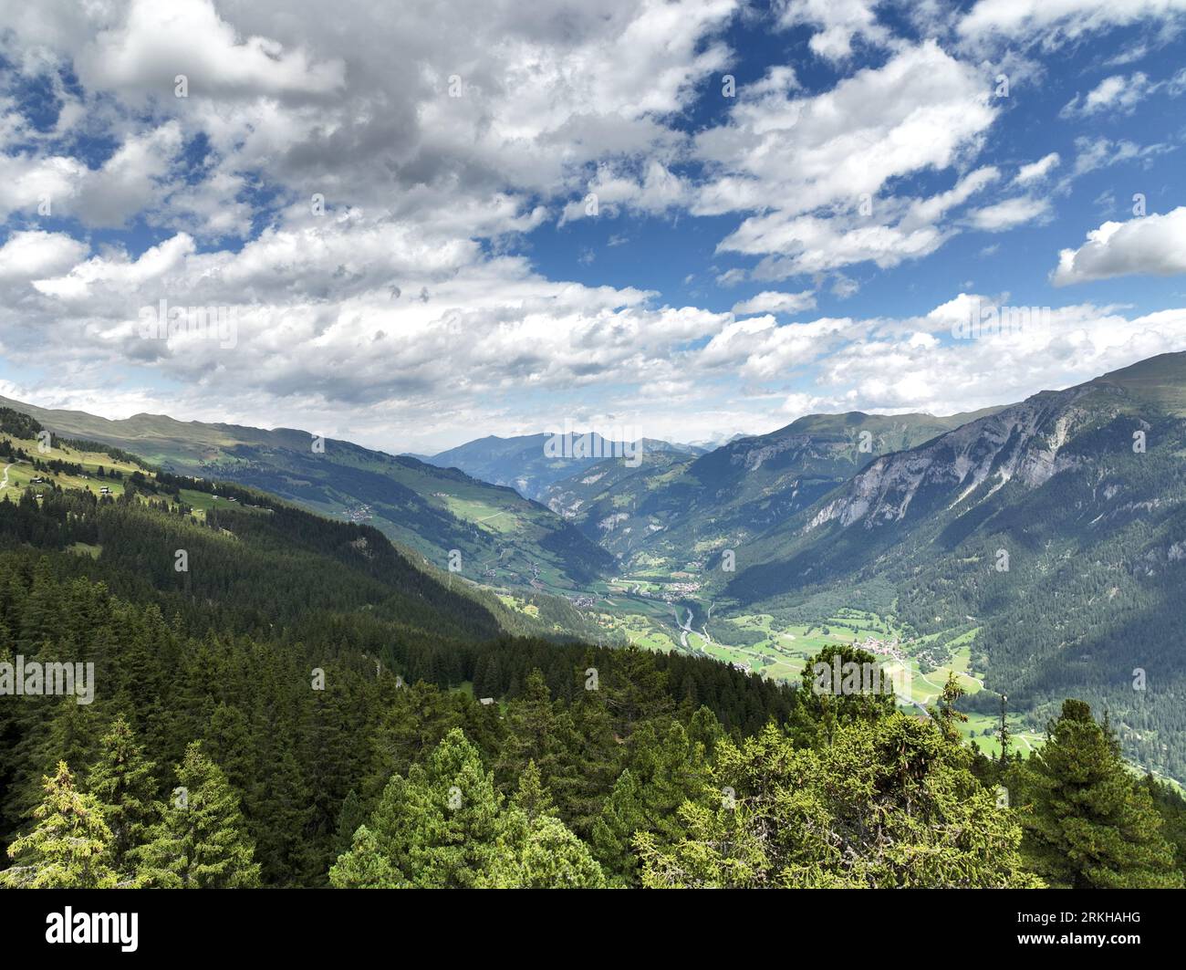 An aerial view of a green mountainous valley in the Swiss alps Stock ...