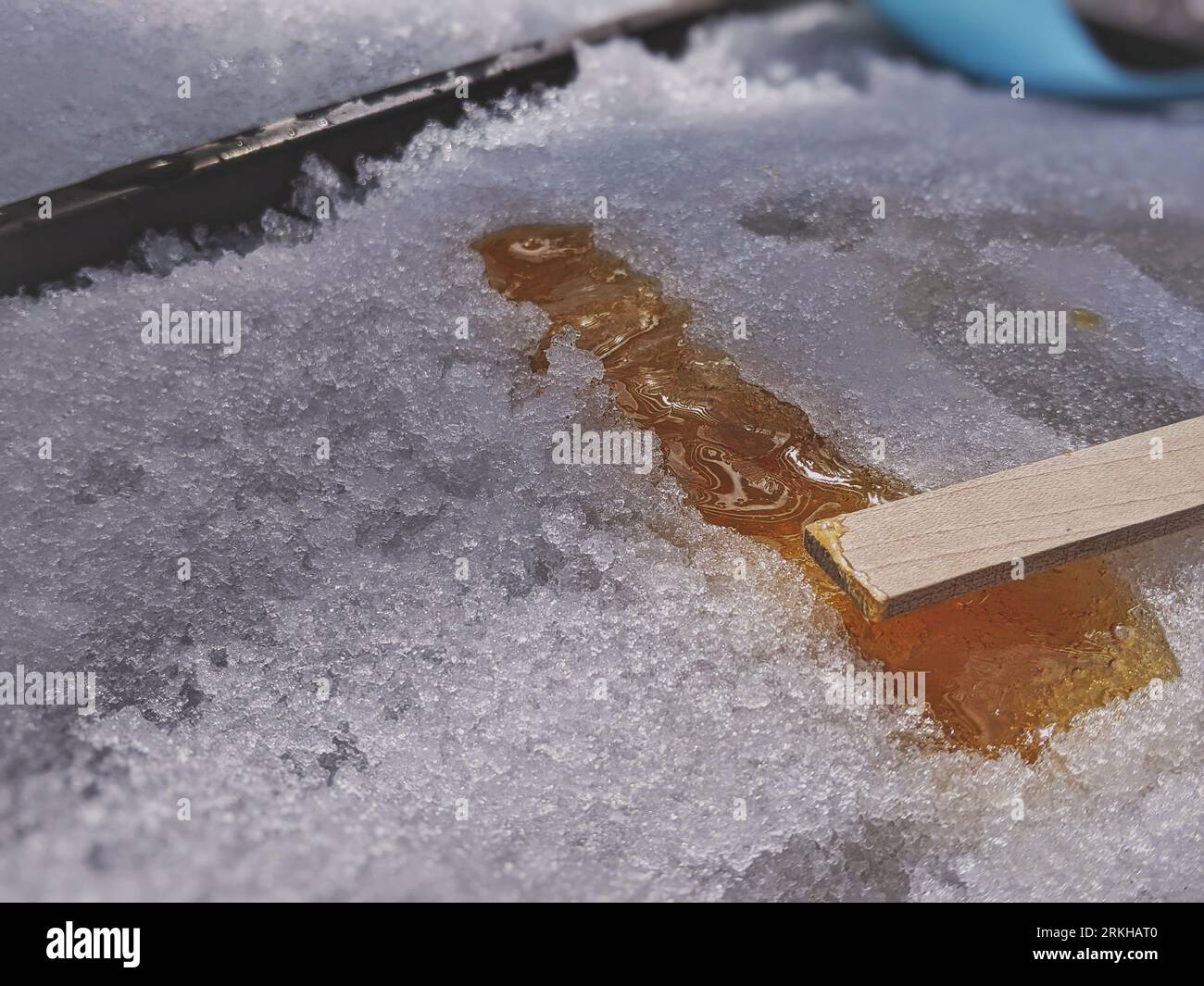 A closeup of Mmaple syrup on freezing ice snow Stock Photo - Alamy