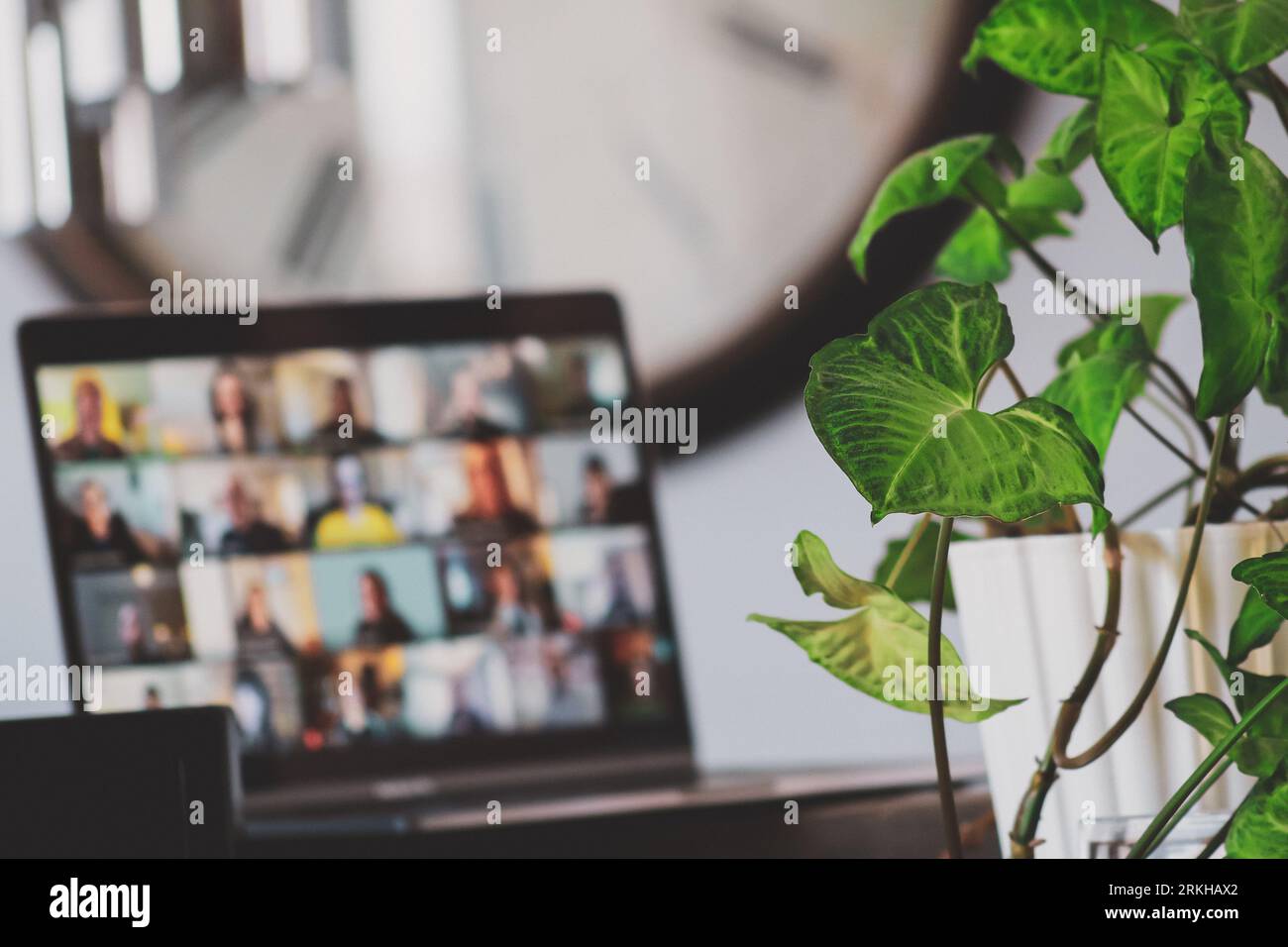 A modern office setting with a laptop computer on a desk Stock Photo ...