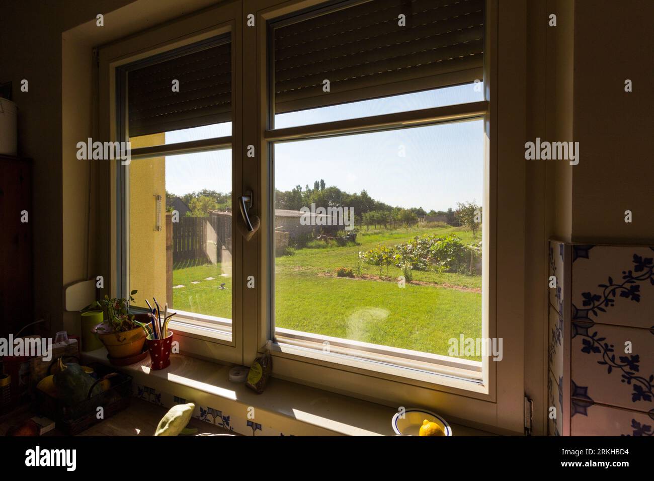 Looking through window in kitchen of a new rural house, Hungary Stock ...