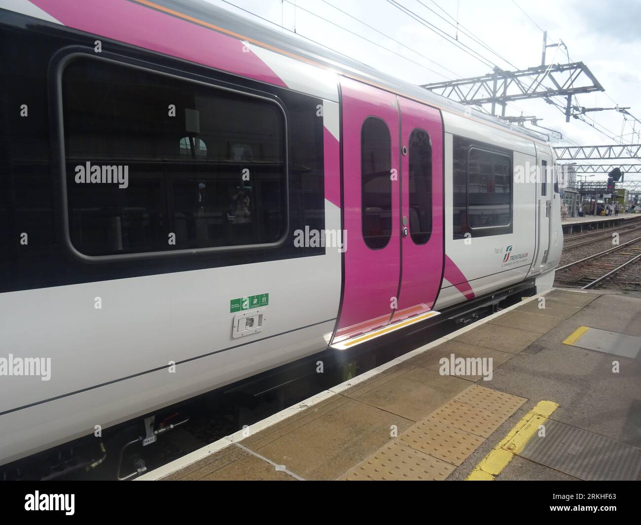 A modern C2C train making a trial stop at Stratford station Stock Photo ...