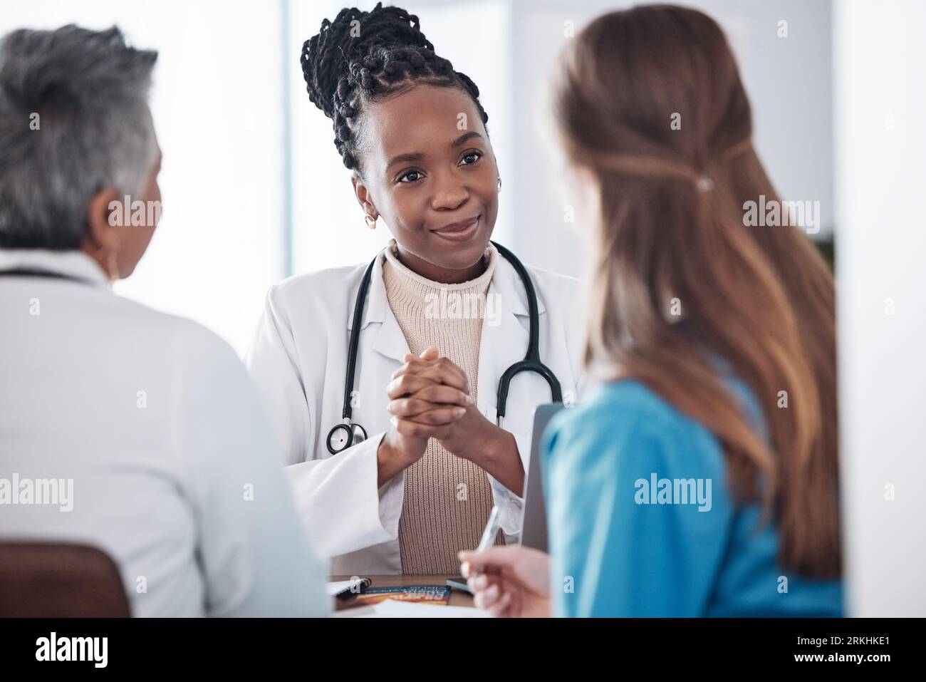 Teamwork, doctors or black woman in meeting or discussion for hospital ...