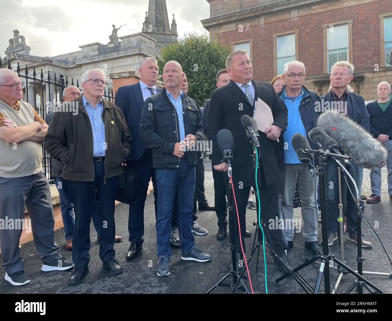 Lawyer Ciaran Shiels with the families of Bloody Sunday victims outside ...