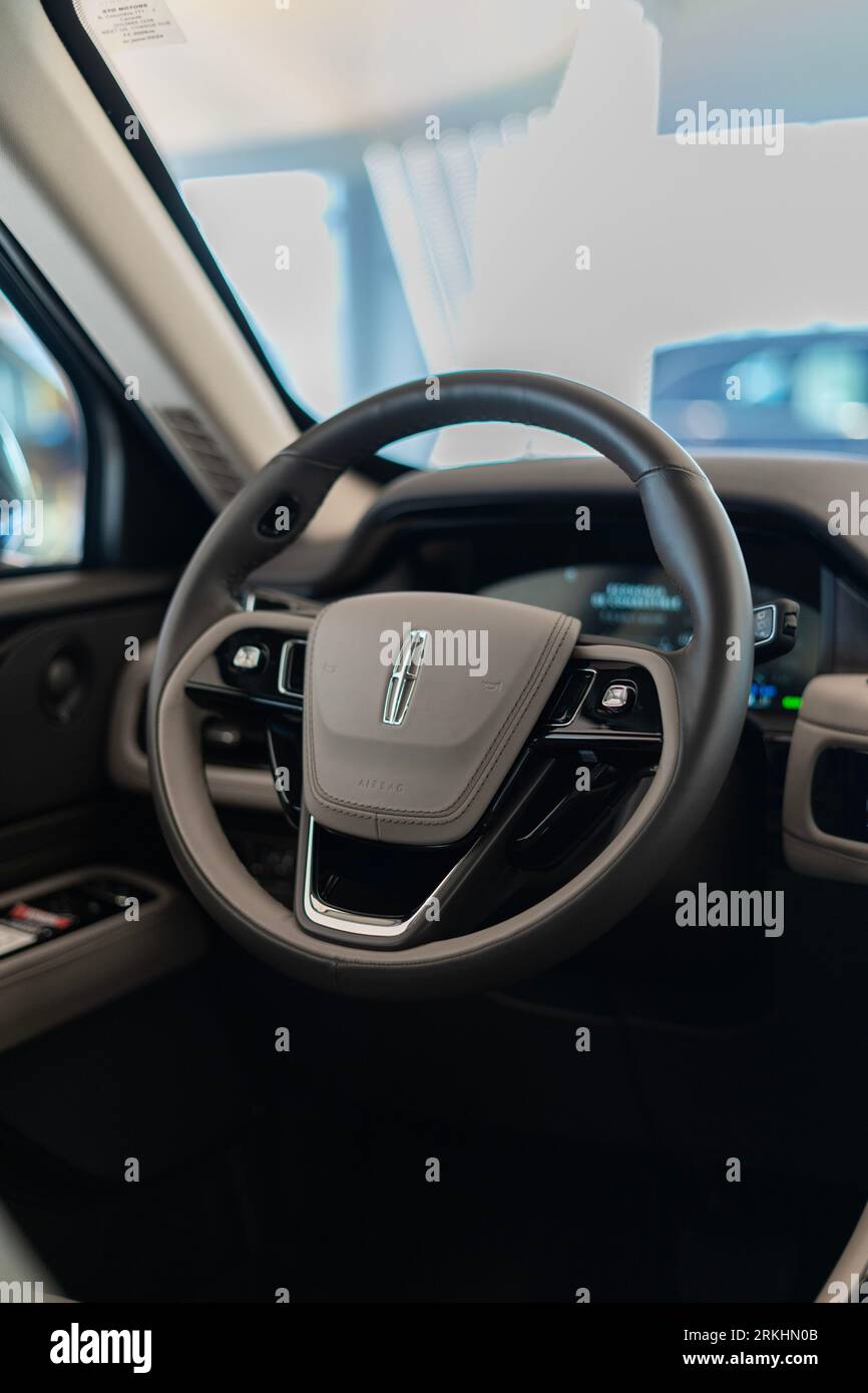 A vertical closeup of a steering wheel of a car Stock Photo - Alamy