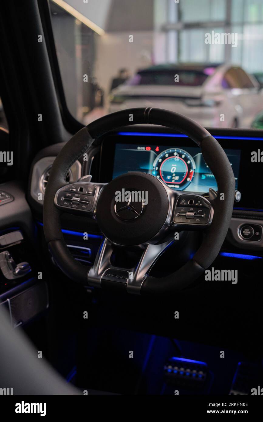 A vertical closeup of a steering wheel of a car Stock Photo - Alamy