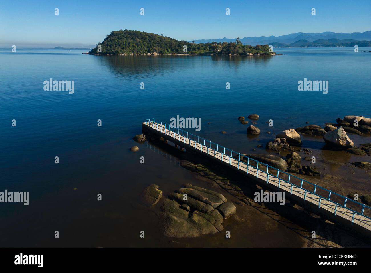 Aerial View of the Pedestrian Pier of the Island With Stones in Water ...