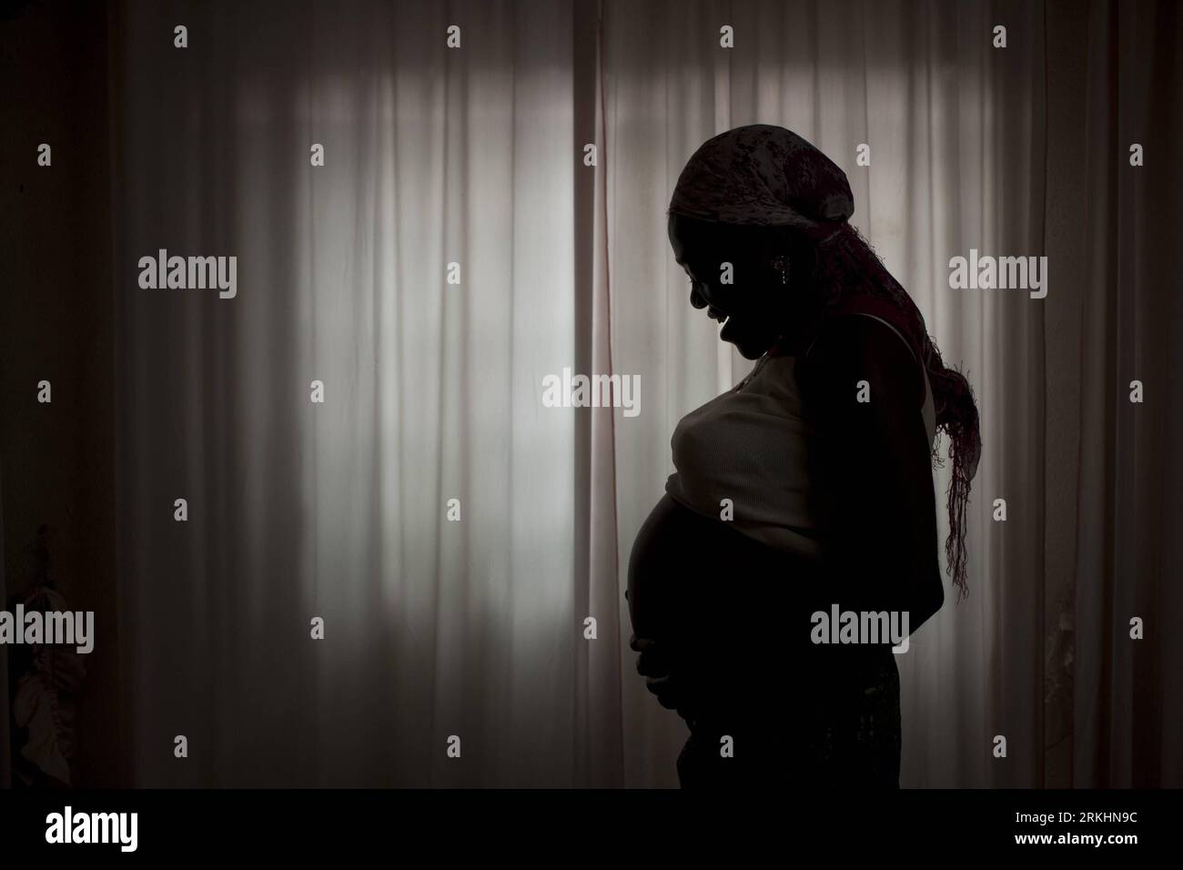Pregnant waitress hi-res stock photography and images - Alamy