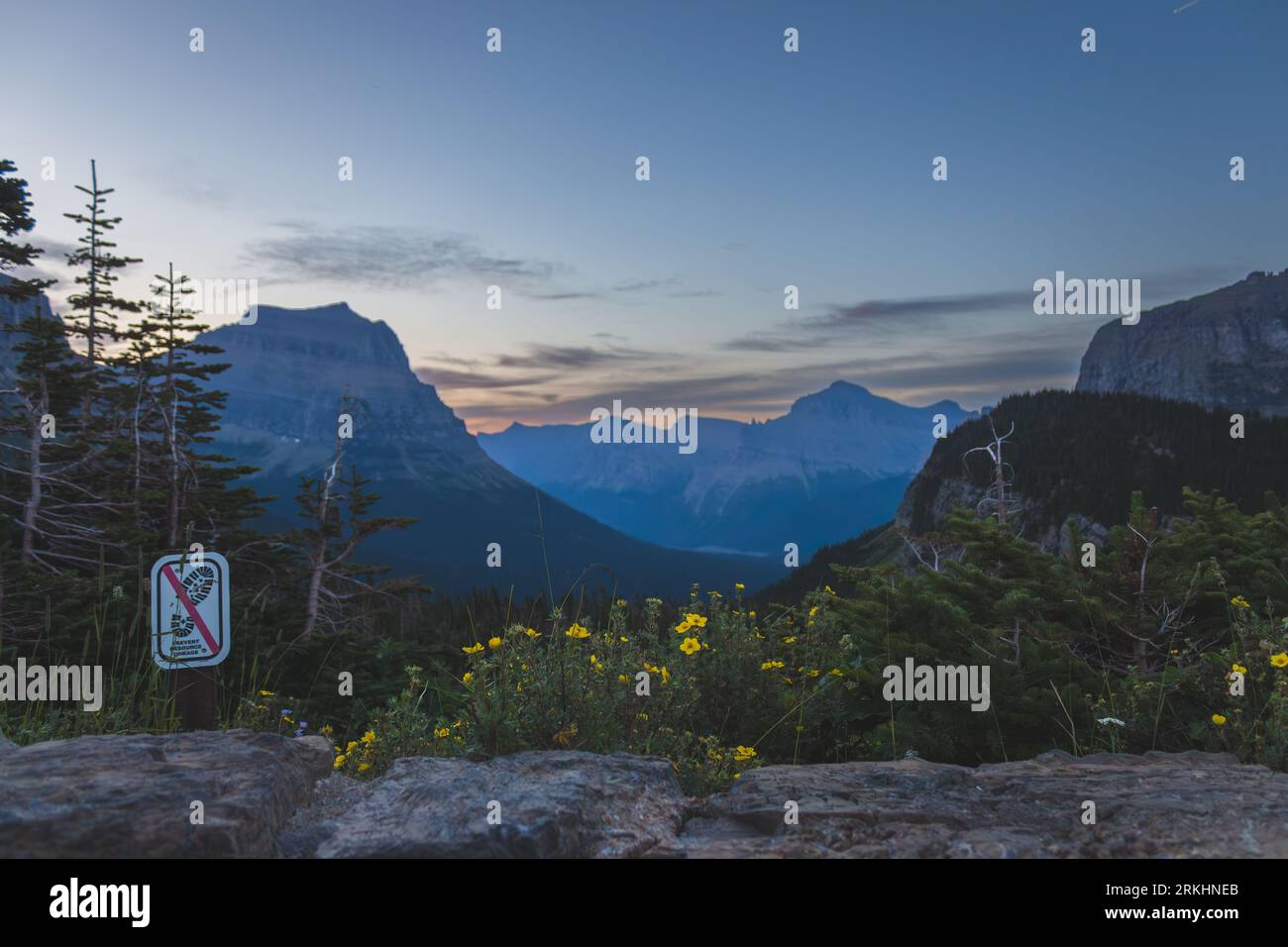 An aerial view of a mountain hiking trail, featuring a winding path ...