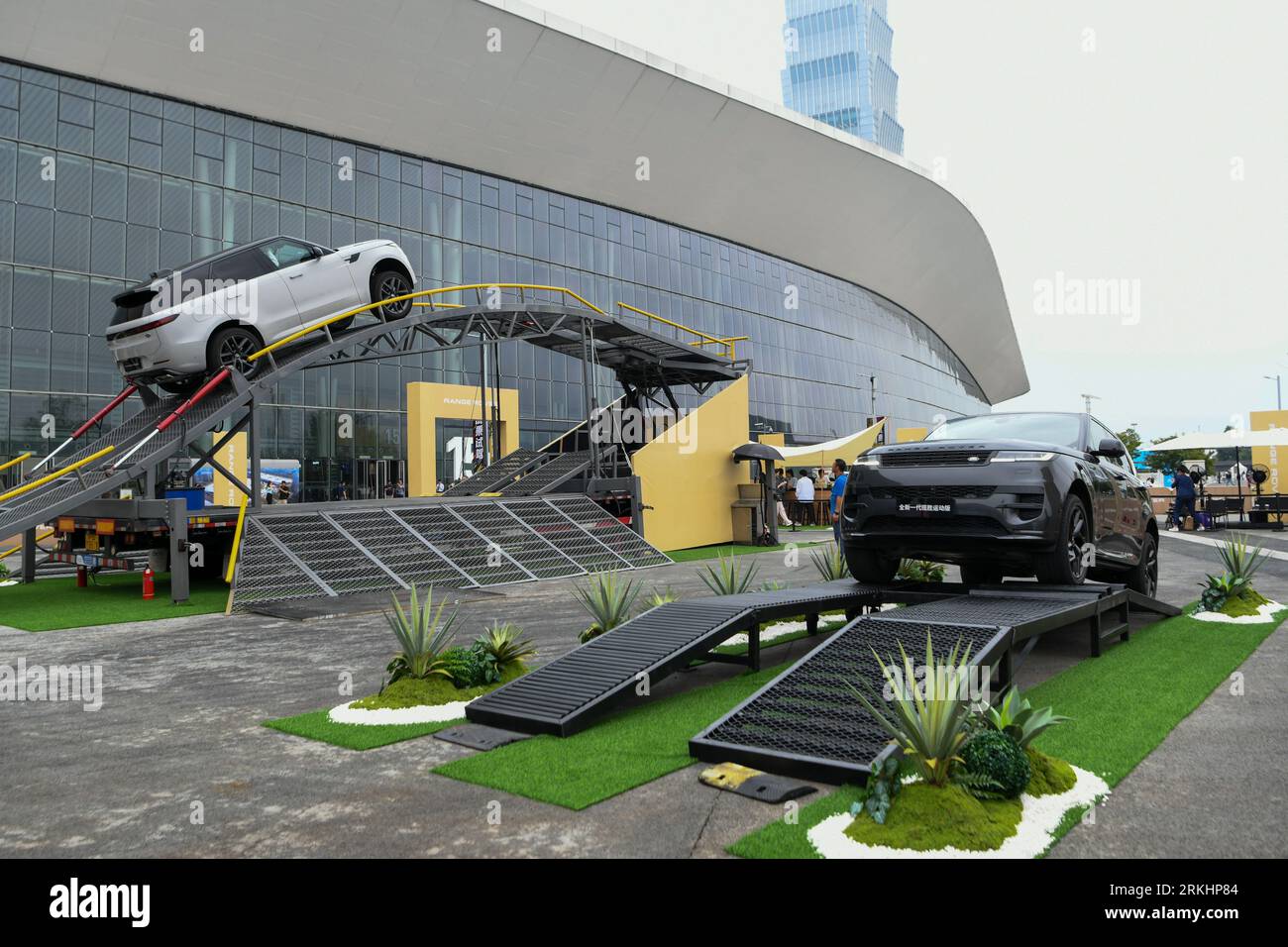 Chengdu, China's Sichuan Province. 25th Aug, 2023. Visitors test drive ...