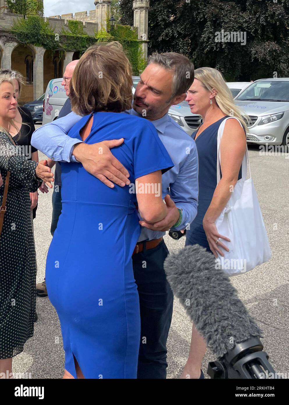 Sarah Moulds is hugged outside Lincoln Crown Court after being cleared ...