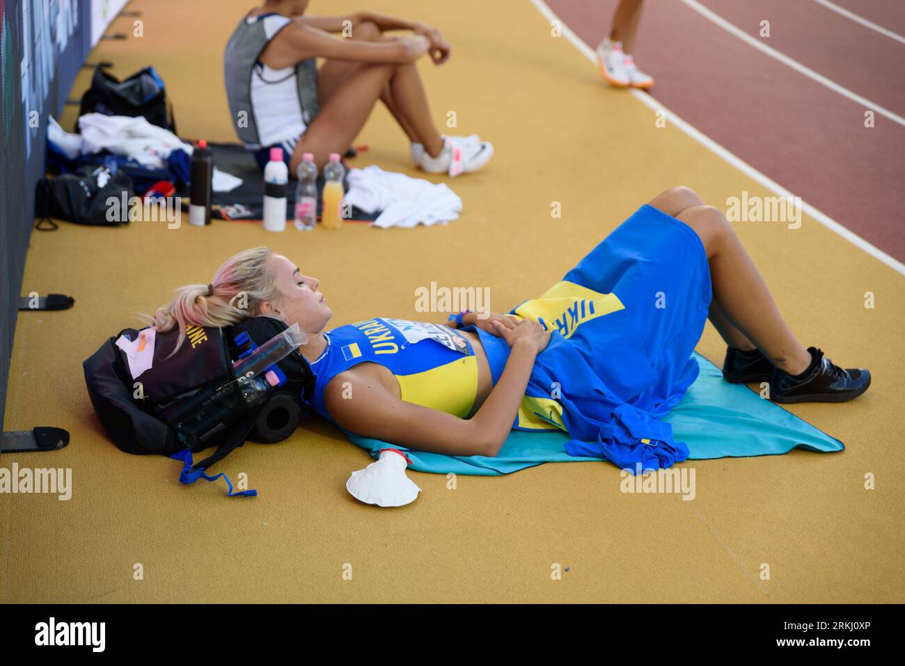 Yuliia Levchenko (Ukraine) resting in the shade during the high jump ...
