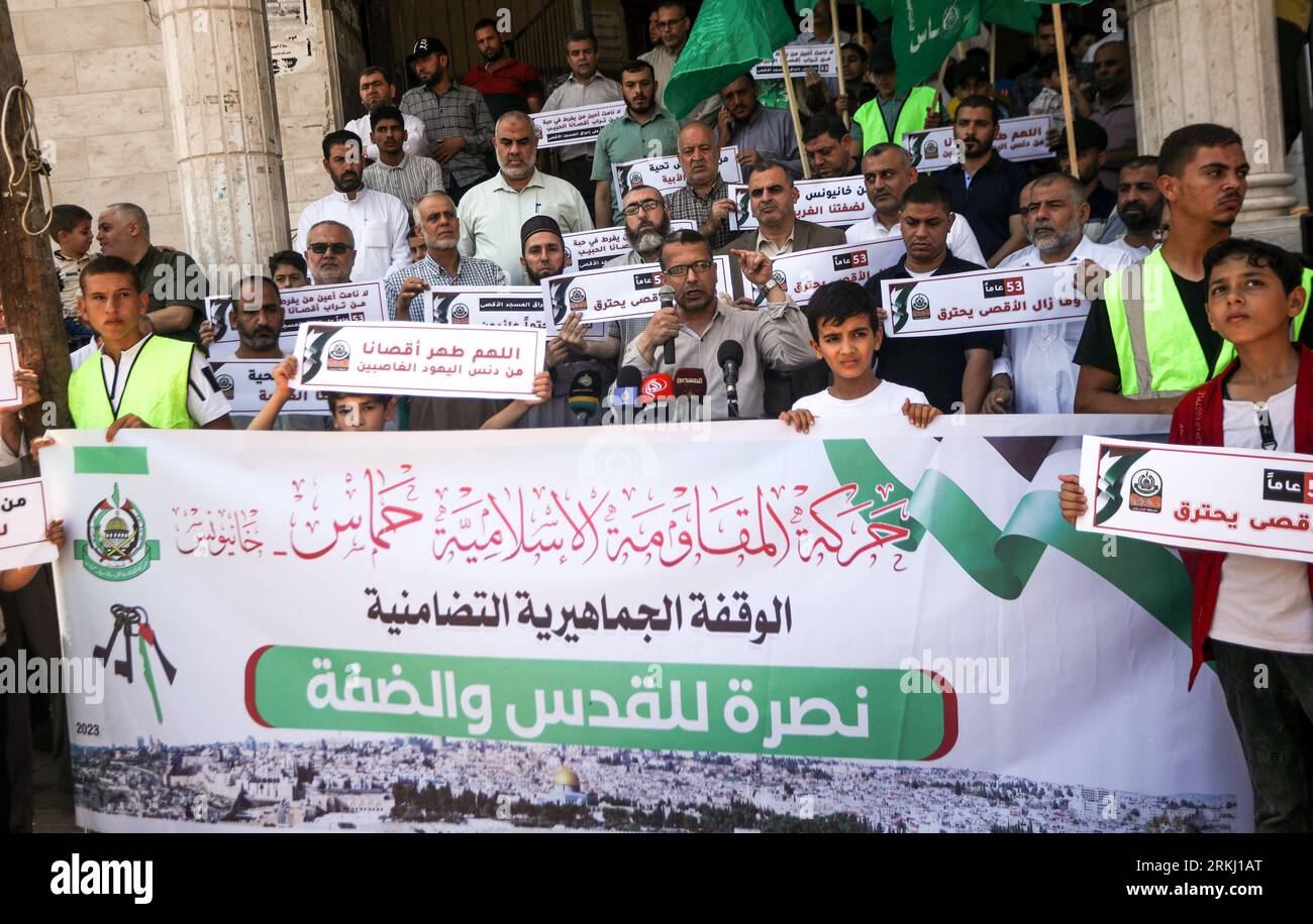 Palestinians wave of Hamas green Islamic and national flags during a ...