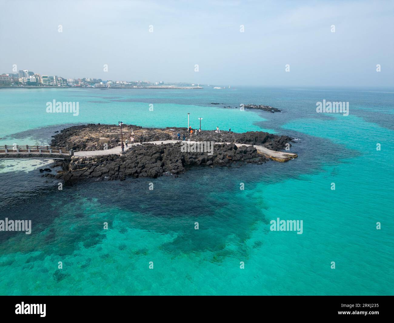 The tranquil waters and towering cliffs beyond South Korea, Jeju in ...