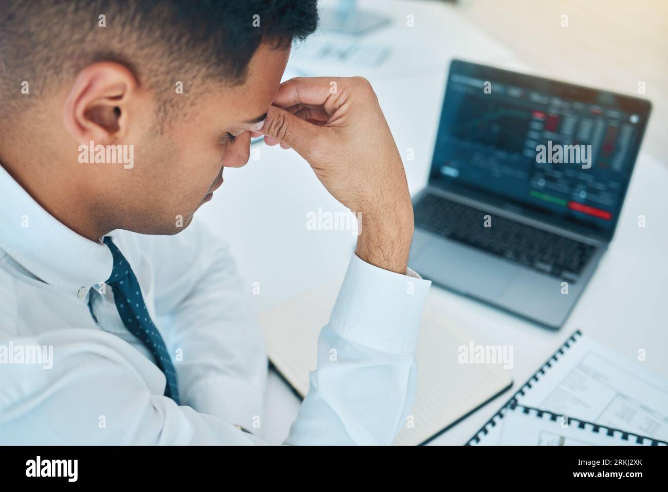 Business man, headache and laptop of stock market crash, bankruptcy and ...