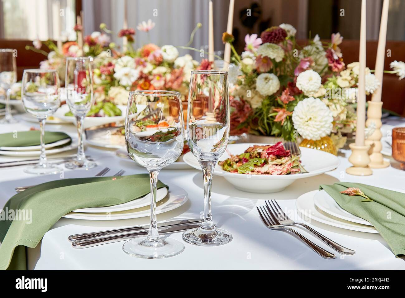 Aesthetic table setting with candles and flowers decorations ...