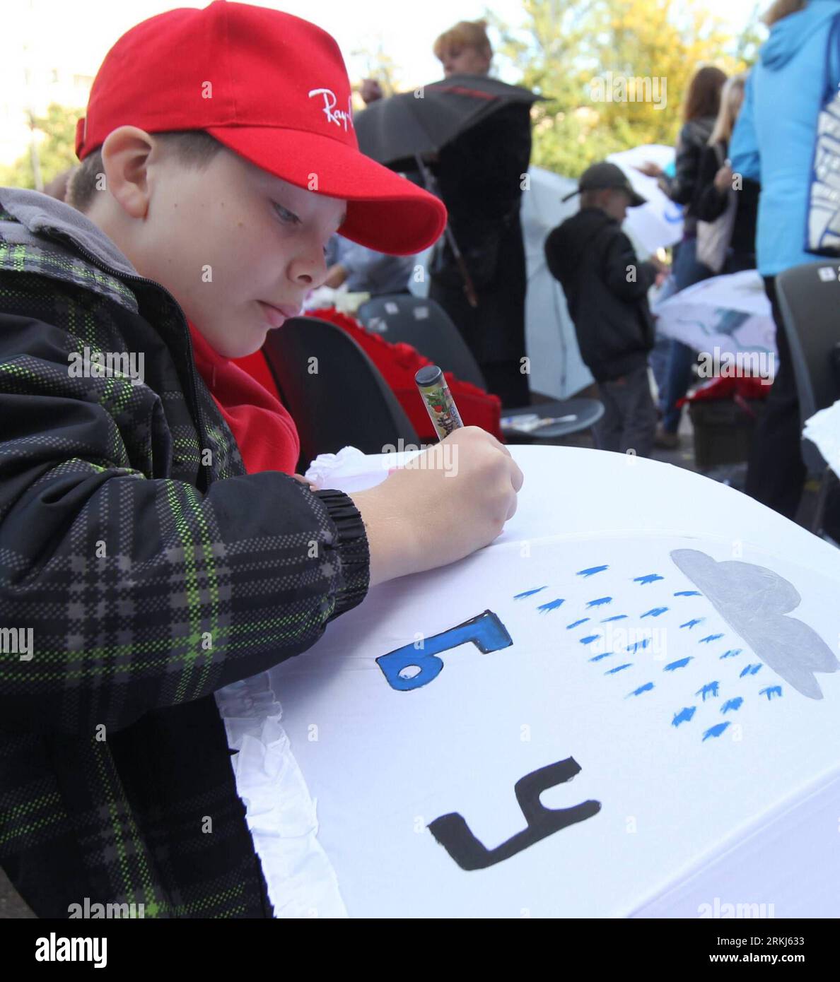 Boy presenting drawing hi-res stock photography and images - Alamy