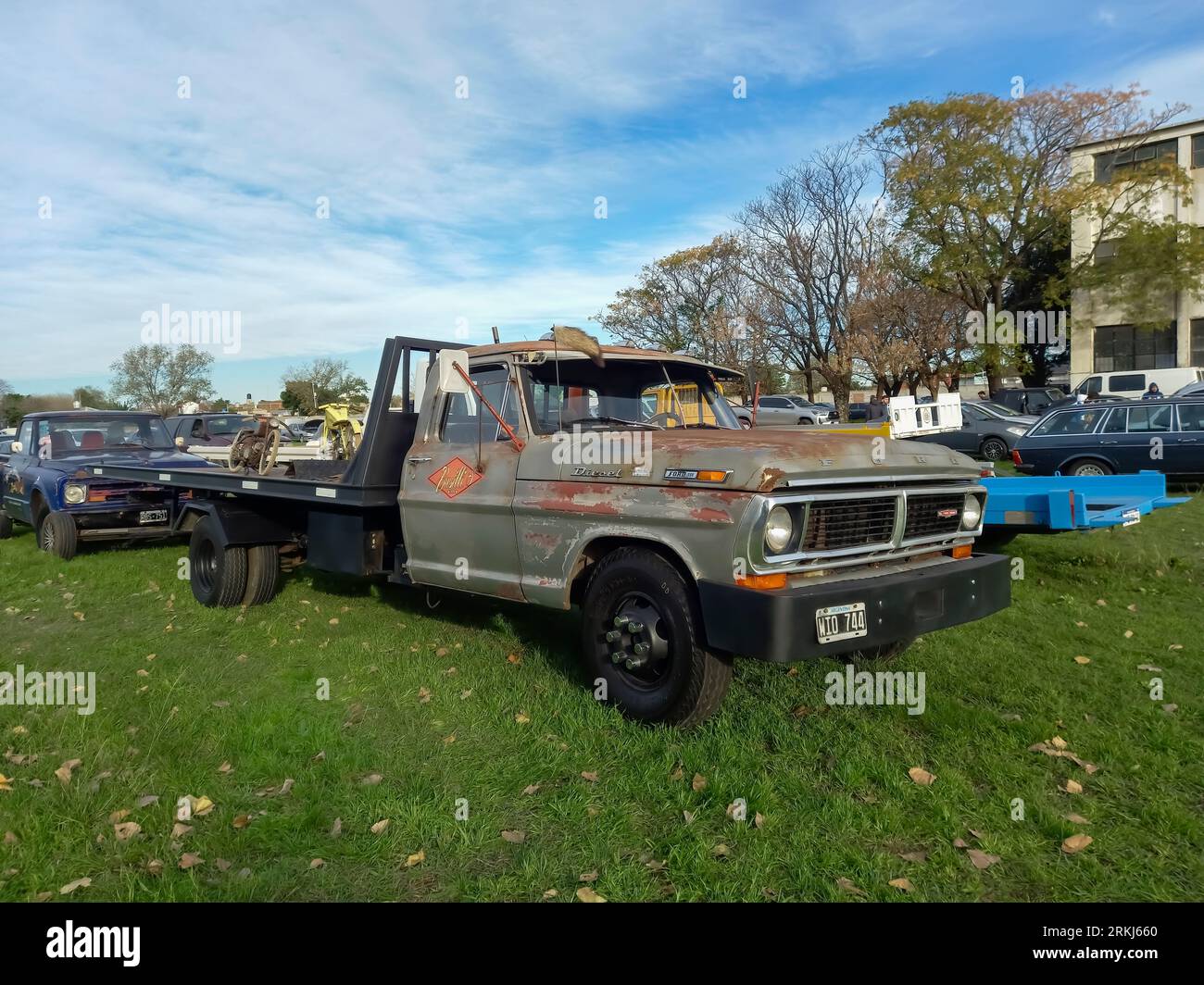 Old worn unpainted 1960s Ford F 350 Diesel flatbed pickup truck on the ...