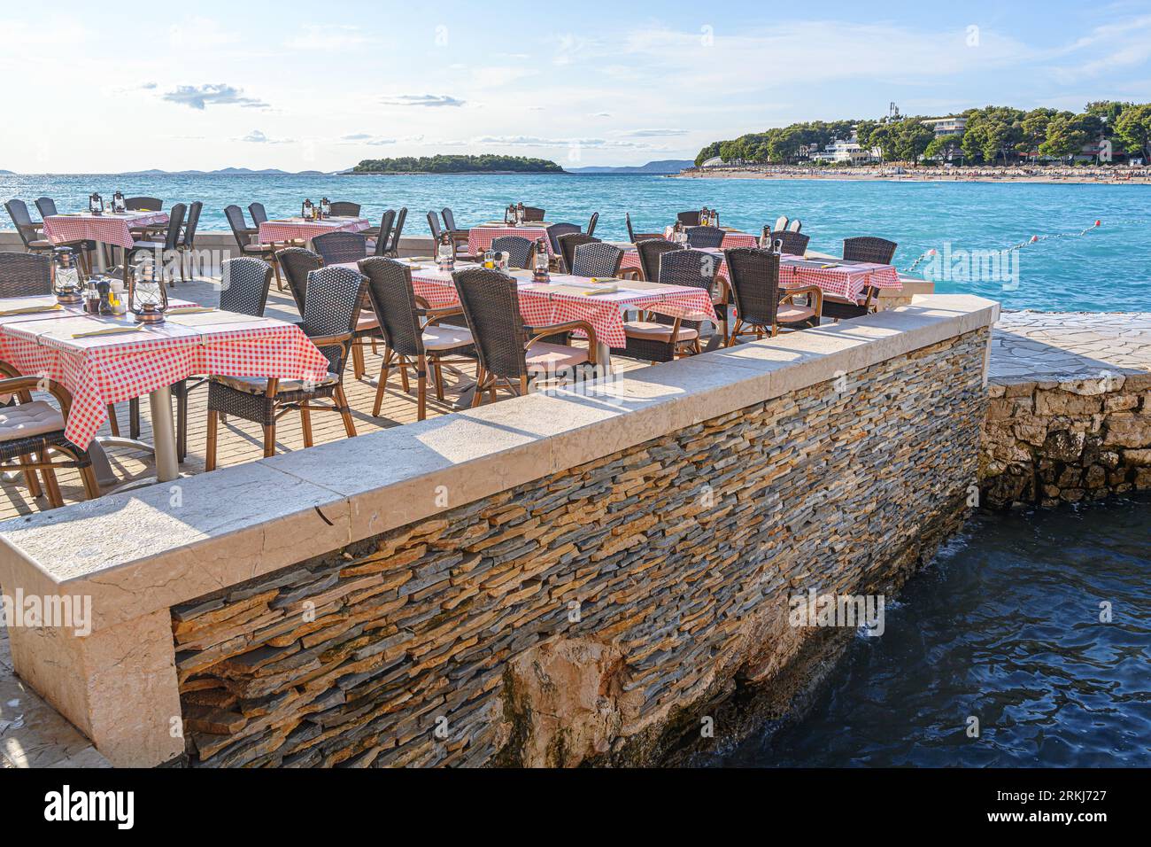 The interior of an open-air restaurant on the seashore Stock Photo - Alamy